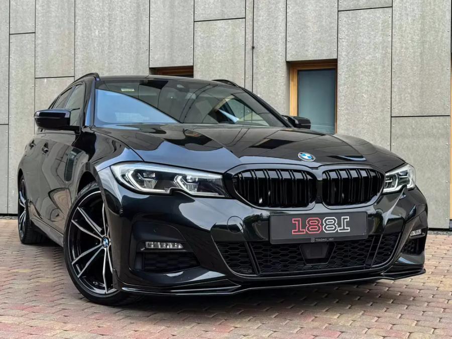 Black BMW 320 2021 in Riga, with an engine capacity of 2.00 L and mileage of 158 thousand km for 21900 €, photo 7 on AUTOMOTO.COM.LV