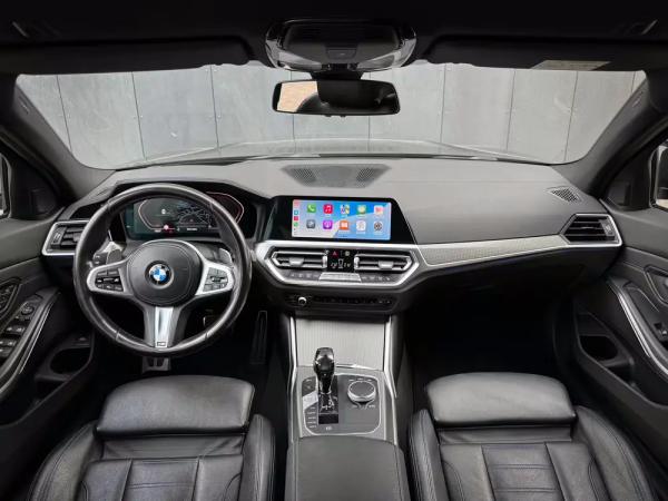 Black BMW 320 2021 in Riga, with an engine capacity of 2.00 L and mileage of 158 thousand km for 21900 €, photo 9 on AUTOMOTO.COM.LV