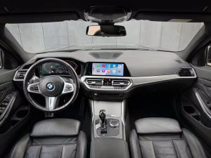 Black BMW 320 2021 in Riga, with an engine capacity of 2.00 L and mileage of 158 thousand km for 21900 €, photo 10 on AUTOMOTO.COM.LV
