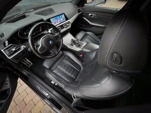 Black BMW 320 2021 in Riga, with an engine capacity of 2.00 L and mileage of 158 thousand km for 21900 €, photo 12 on AUTOMOTO.COM.LV