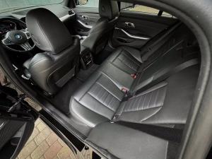 Black BMW 320 2021 in Riga, with an engine capacity of 2.00 L and mileage of 158 thousand km for 21900 €, photo 16 on AUTOMOTO.COM.LV