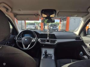 Black BMW 320 2021 in Kaunas, with an engine capacity of 2.00 L and mileage of 203 thousand km for 15900 €, photo 19 on AUTOMOTO.COM.LV
