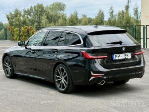 Black BMW 320 2021 in Riga, with an engine capacity of 2.00 L and mileage of 199 thousand km for 21490 €, photo 5 on AUTOMOTO.COM.LV