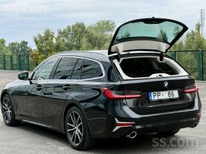 Black BMW 320 2021 in Riga, with an engine capacity of 2.00 L and mileage of 199 thousand km for 21490 €, photo 6 on AUTOMOTO.COM.LV