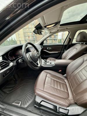 Black BMW 320 2021 in Riga, with an engine capacity of 2.00 L and mileage of 199 thousand km for 21490 €, photo 12 on AUTOMOTO.COM.LV