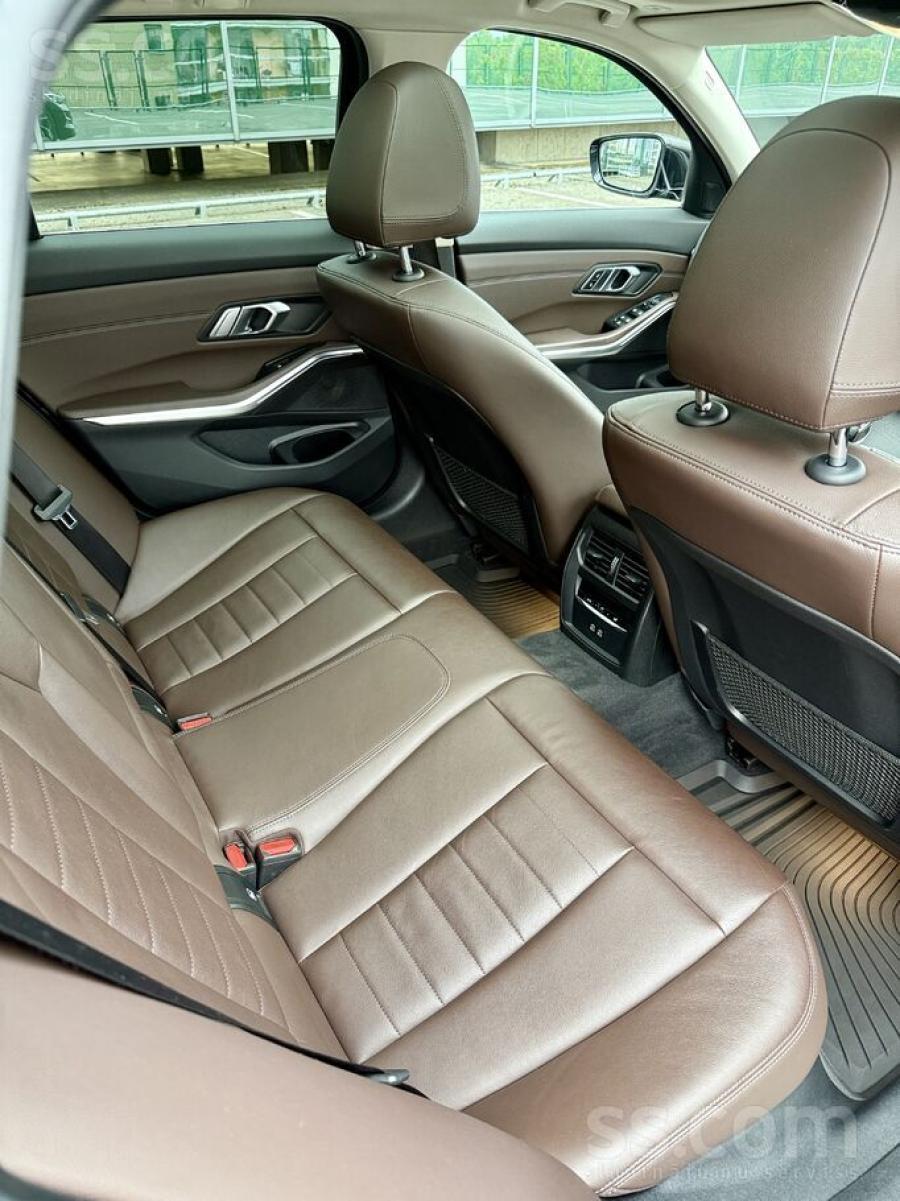Black BMW 320 2021 in Riga, with an engine capacity of 2.00 L and mileage of 199 thousand km for 21490 €, photo 14 on AUTOMOTO.COM.LV