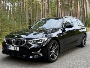 Black BMW 320 2021 in Riga, with an engine capacity of 2.00 L and mileage of 199 thousand km for 17490 €, photo 1 on AUTOMOTO.COM.LV