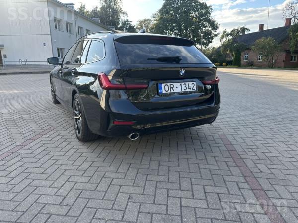 Black BMW 320 2021 in Valmiera, with an engine capacity of 2.00 L and mileage of 227 thousand km for 20450 €, photo 4 on AUTOMOTO.COM.LV