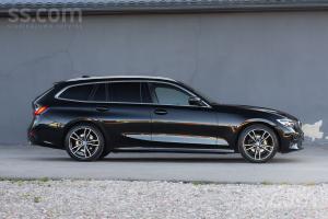 Black BMW 320 2021 in Jelgava, with an engine capacity of 2.00 L and mileage of 193 thousand km for 18500 €, photo 4 on AUTOMOTO.COM.LV