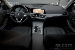 Black BMW 320 2021 in Jelgava, with an engine capacity of 2.00 L and mileage of 193 thousand km for 18500 €, photo 9 on AUTOMOTO.COM.LV
