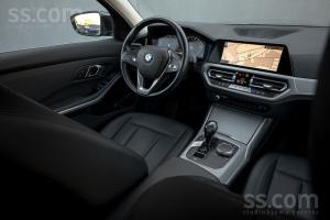 Black BMW 320 2021 in Jelgava, with an engine capacity of 2.00 L and mileage of 193 thousand km for 18500 €, photo 10 on AUTOMOTO.COM.LV