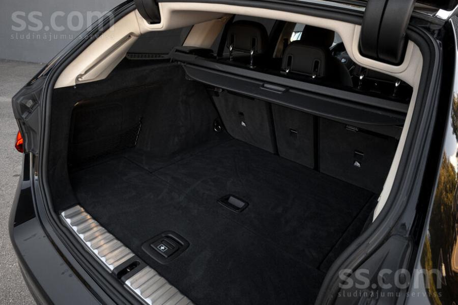 Black BMW 320 2021 in Jelgava, with an engine capacity of 2.00 L and mileage of 193 thousand km for 18500 €, photo 14 on AUTOMOTO.COM.LV