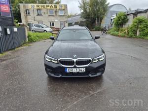 Black BMW 320 2021 in Riga, with an engine capacity of 2.00 L and mileage of 226 thousand km for 18590 €, photo 4 on AUTOMOTO.COM.LV