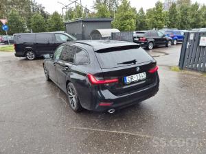 Black BMW 320 2021 in Riga, with an engine capacity of 2.00 L and mileage of 226 thousand km for 18590 €, photo 8 on AUTOMOTO.COM.LV