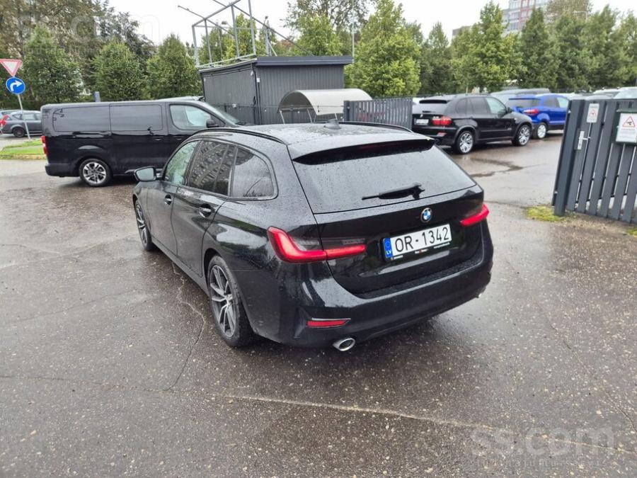 Black BMW 320 2021 in Riga, with an engine capacity of 2.00 L and mileage of 226 thousand km for 18590 €, photo 8 on AUTOMOTO.COM.LV