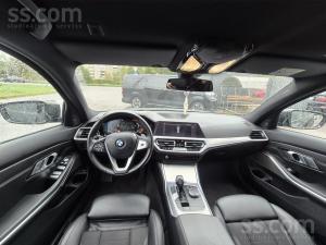 Black BMW 320 2021 in Riga, with an engine capacity of 2.00 L and mileage of 226 thousand km for 18590 €, photo 10 on AUTOMOTO.COM.LV