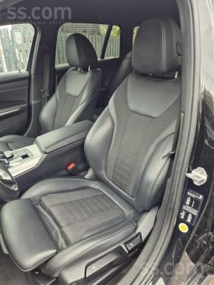 Black BMW 320 2021 in Riga, with an engine capacity of 2.00 L and mileage of 226 thousand km for 18590 €, photo 15 on AUTOMOTO.COM.LV