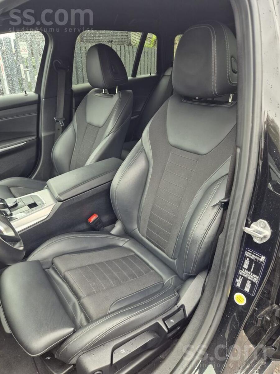 Black BMW 320 2021 in Riga, with an engine capacity of 2.00 L and mileage of 226 thousand km for 18590 €, photo 15 on AUTOMOTO.COM.LV