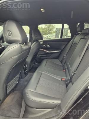 Black BMW 320 2021 in Riga, with an engine capacity of 2.00 L and mileage of 226 thousand km for 18590 €, photo 17 on AUTOMOTO.COM.LV