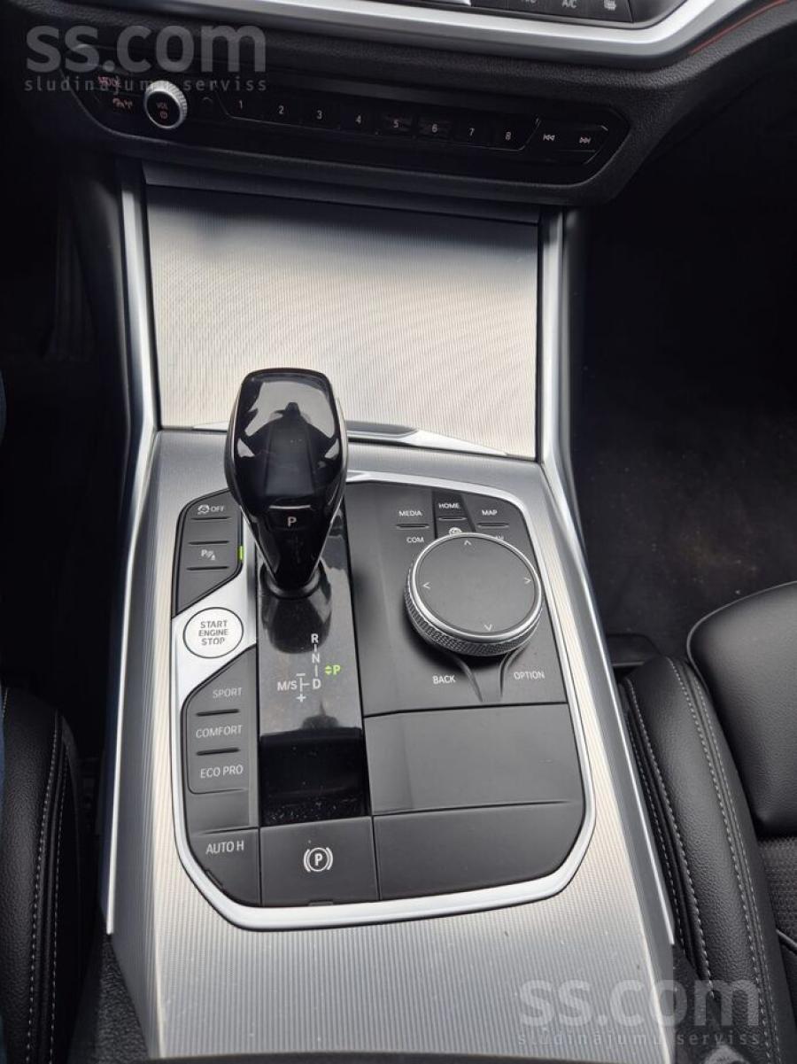 Black BMW 320 2021 in Riga, with an engine capacity of 2.00 L and mileage of 226 thousand km for 18590 €, photo 18 on AUTOMOTO.COM.LV