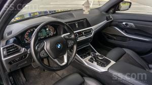Black BMW 320 2021 in Riga, with an engine capacity of 2.00 L and mileage of 226 thousand km for 18590 €, photo 11 on AUTOMOTO.COM.LV