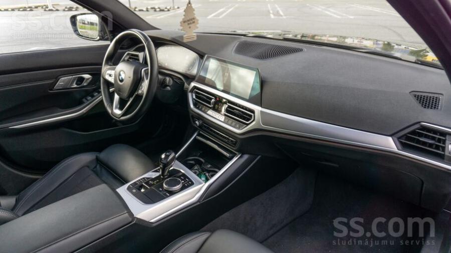 Black BMW 320 2021 in Riga, with an engine capacity of 2.00 L and mileage of 226 thousand km for 18590 €, photo 12 on AUTOMOTO.COM.LV