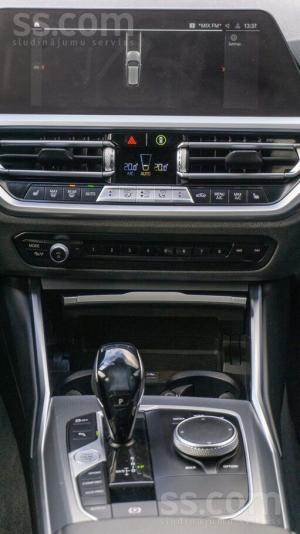 Black BMW 320 2021 in Riga, with an engine capacity of 2.00 L and mileage of 226 thousand km for 18590 €, photo 14 on AUTOMOTO.COM.LV