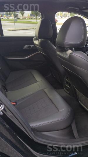 Black BMW 320 2021 in Riga, with an engine capacity of 2.00 L and mileage of 226 thousand km for 18590 €, photo 31 on AUTOMOTO.COM.LV