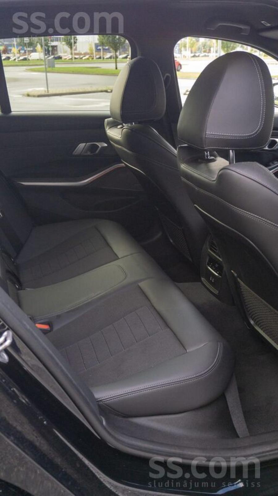 Black BMW 320 2021 in Riga, with an engine capacity of 2.00 L and mileage of 226 thousand km for 18590 €, photo 31 on AUTOMOTO.COM.LV