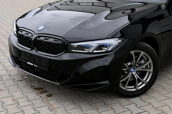 Black BMW 320 2022 in Kretinga, with an engine capacity of 2.00 L and mileage of 105 thousand km for 24499 €, photo 4 on AUTOMOTO.COM.LV