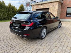 Black BMW 320 2022 in Saldus, with an engine capacity of 2.00 L and mileage of 124 thousand km for 23000 €, photo 5 on AUTOMOTO.COM.LV