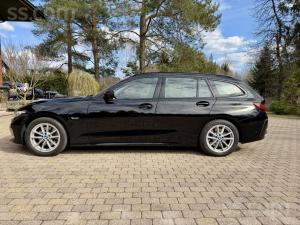 Black BMW 320 2022 in Saldus, with an engine capacity of 2.00 L and mileage of 124 thousand km for 23000 €, photo 7 on AUTOMOTO.COM.LV