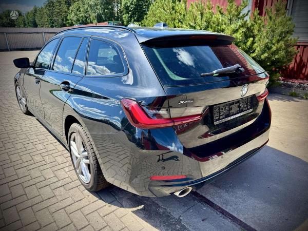 Black BMW 320 2022 in Prienai, with an engine capacity of 2.00 L and mileage of 93 thousand km for 8999 €, photo 1 on AUTOMOTO.COM.LV