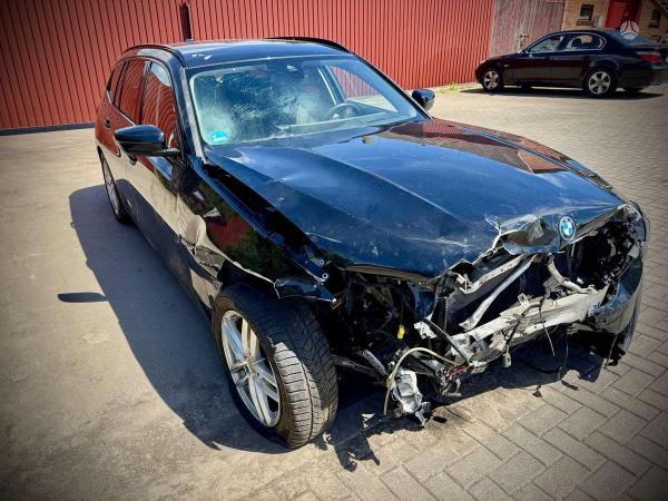 Black BMW 320 2022 in Prienai, with an engine capacity of 2.00 L and mileage of 93 thousand km for 8999 €, photo 6 on AUTOMOTO.COM.LV