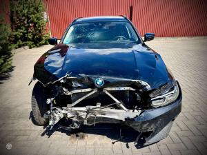 Black BMW 320 2022 in Prienai, with an engine capacity of 2.00 L and mileage of 93 thousand km for 8999 €, photo 8 on AUTOMOTO.COM.LV