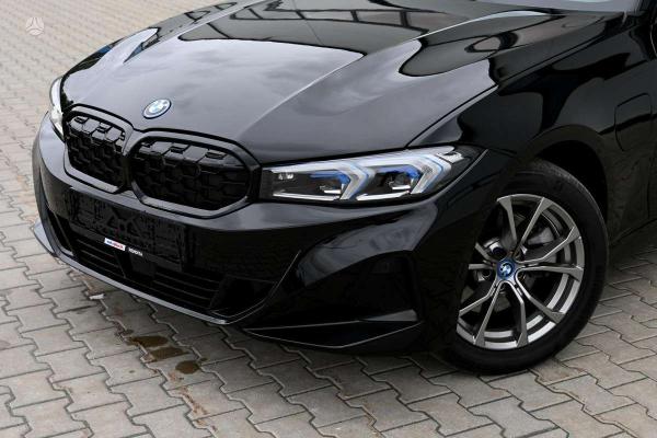 Black BMW 320 2022 in Kretinga, with an engine capacity of 2.00 L and mileage of 105 thousand km for 23499 €, photo 4 on AUTOMOTO.COM.LV