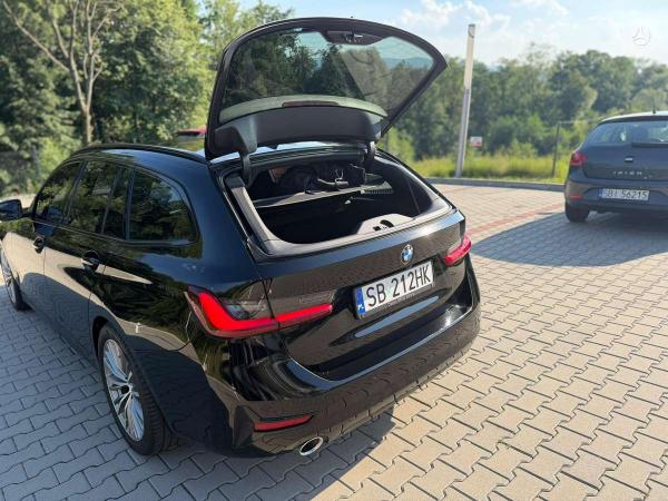 Black BMW 320 2022 in Vilnius, with an engine capacity of 2.00 L and mileage of 130 thousand km for 24000 €, photo 5 on AUTOMOTO.COM.LV