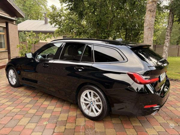 Black BMW 320 2022 in Panevezys, with an engine capacity of 2.00 L and mileage of 56 thousand km for 24350 €, photo 7 on AUTOMOTO.COM.LV