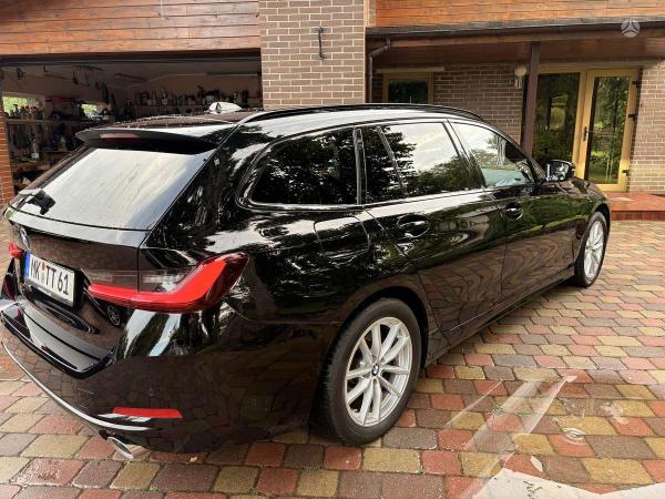 Black BMW 320 2022 in Panevezys, with an engine capacity of 2.00 L and mileage of 56 thousand km for 24350 €, photo 8 on AUTOMOTO.COM.LV