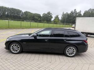 Black BMW 320 2022 in Marijampole, with an engine capacity of 2.00 L and mileage of 123 thousand km for 22900 €, photo 15 on AUTOMOTO.COM.LV