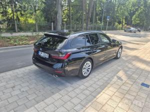Black BMW 320 2022 in Riga, with an engine capacity of 2.00 L and mileage of 173 thousand km for 19900 €, photo 5 on AUTOMOTO.COM.LV