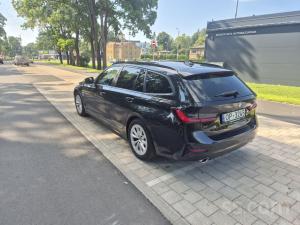 Black BMW 320 2022 in Riga, with an engine capacity of 2.00 L and mileage of 173 thousand km for 19900 €, photo 7 on AUTOMOTO.COM.LV