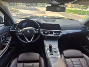 Black BMW 320 2022 in Riga, with an engine capacity of 2.00 L and mileage of 173 thousand km for 19900 €, photo 8 on AUTOMOTO.COM.LV