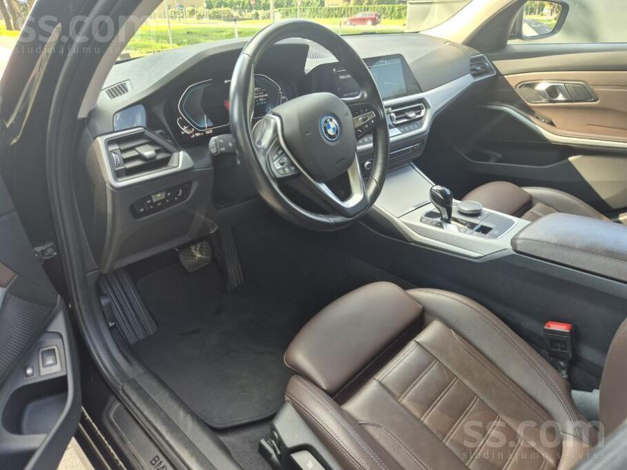 Black BMW 320 2022 in Riga, with an engine capacity of 2.00 L and mileage of 173 thousand km for 19900 €, photo 9 on AUTOMOTO.COM.LV