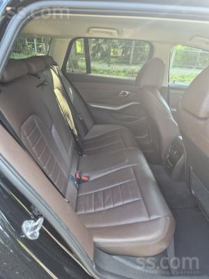 Black BMW 320 2022 in Riga, with an engine capacity of 2.00 L and mileage of 173 thousand km for 19900 €, photo 11 on AUTOMOTO.COM.LV