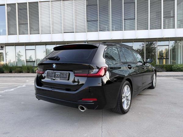 Black BMW 320 2022 in Vilnius, with an engine capacity of 2.00 L and mileage of 199 thousand km for 20500 €, photo 8 on AUTOMOTO.COM.LV