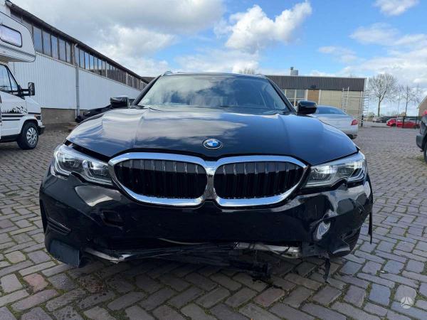 Black BMW 320 2022 in Kaunas, with an engine capacity of 2.00 L and mileage of 118 thousand km for 14600 €, photo 5 on AUTOMOTO.COM.LV