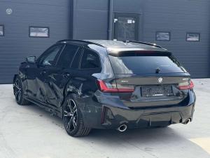 Black BMW 320 2022 in Kaunas, with an engine capacity of 2.00 L and mileage of 125 thousand km for 12450 €, photo 5 on AUTOMOTO.COM.LV