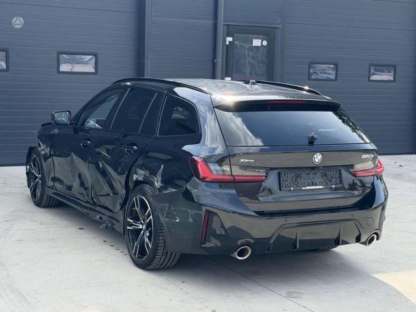 Black BMW 320 2022 in Kaunas, with an engine capacity of 2.00 L and mileage of 125 thousand km for 12450 €, photo 5 on AUTOMOTO.COM.LV