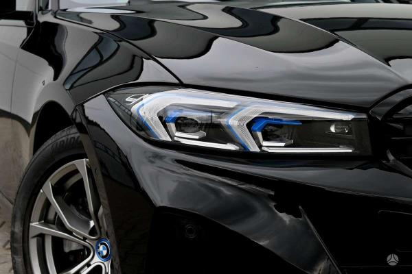 Black BMW 320 2022 in Kretinga, with an engine capacity of 2.00 L and mileage of 105 thousand km for 23499 €, photo 8 on AUTOMOTO.COM.LV